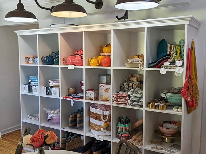 Kitchen treasures in every cubby. Those colorful teapots aren't just decorative—they're silent witnesses to countless sweet conversations.