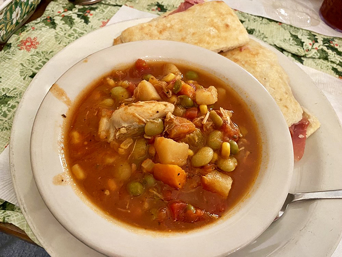 Brunswick stew that looks like it simmered through at least one presidential administration. Each spoonful delivers vegetables, meat, and Southern comfort in equal measure.