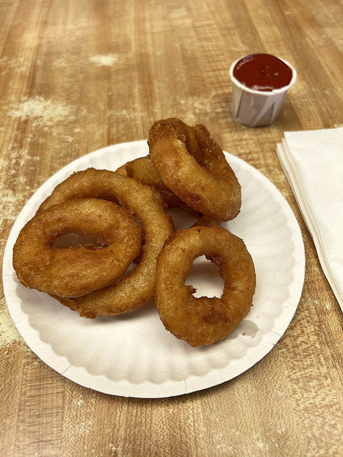 Onion rings so perfectly golden, they deserve their own Olympic medal category. Crunchy on the outside, sweet surrender within.