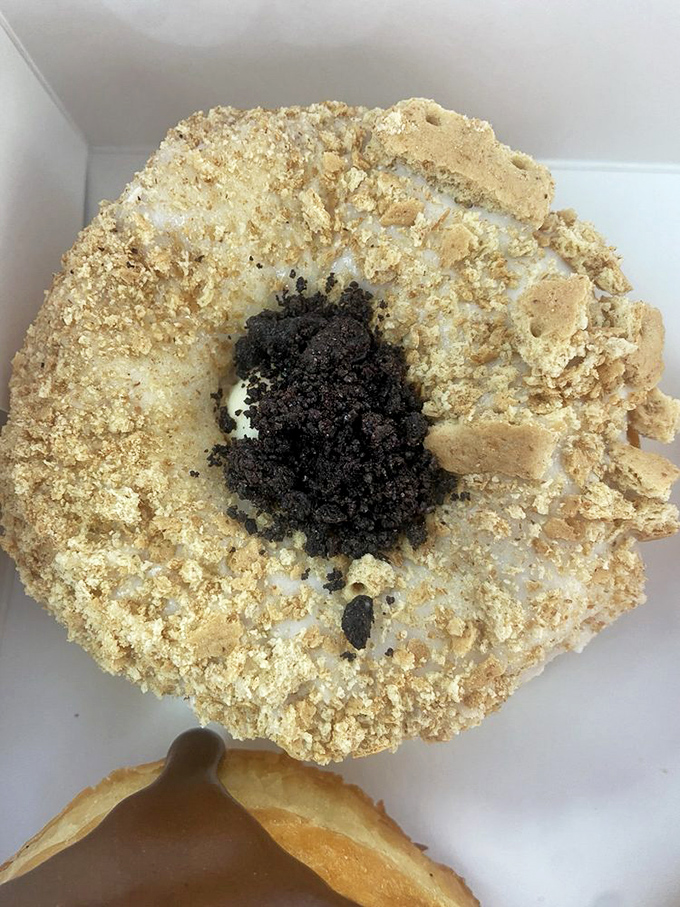 Cookie meets cheesecake meets donut in an unholy alliance of deliciousness. The Oreo crumbles on top are just showing off at this point.