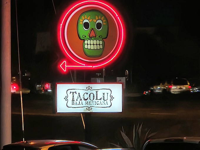 That neon sugar skull sign doesn't just say "TacoLu"&mdash;it says "Your boring dinner plans are officially canceled." A beacon of flavor.