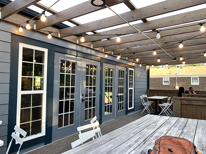 A garden patio that transforms coffee breaks into mini-vacations. Those concrete pavers and bistro tables are practically begging you to linger.