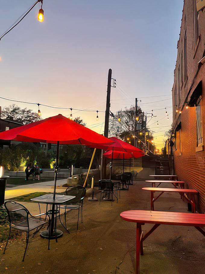 The patio at sunset&mdash;where string lights and red umbrellas create the perfect backdrop for alfresco hot dog happiness.