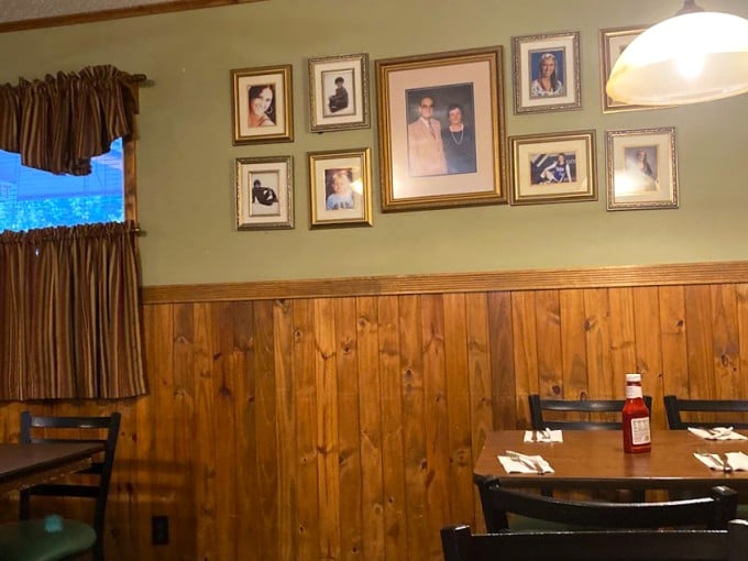Family photos tell the story better than any mission statement. These walls hold generations of history in a business where heritage is as important as the secret recipe.