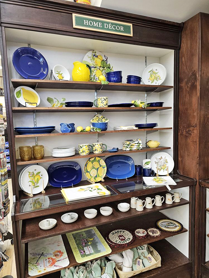 Cheerful lemons dance across cobalt blue dishware creating a tabletop Mediterranean vacation without requiring a single passport stamp.
