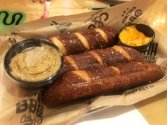 Pretzel breadsticks that achieve the impossible: perfectly chewy inside, gloriously golden outside, with dipping sauces playing perfect wingmen to the main attraction.