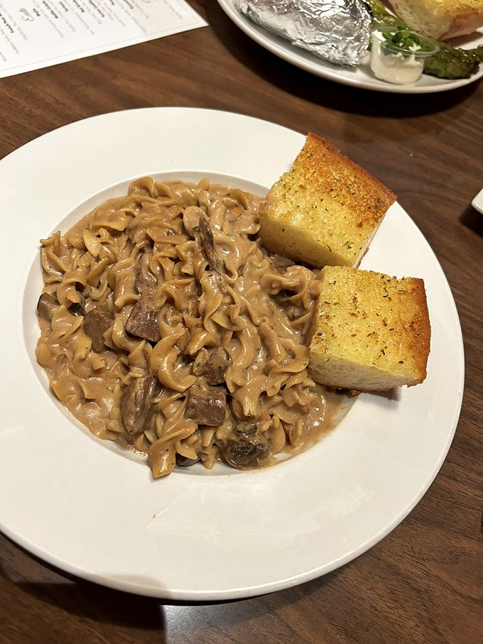 Stroganoff that would make a Russian grandmother weep with joy. Those mushrooms have clearly been simmering in secrets.