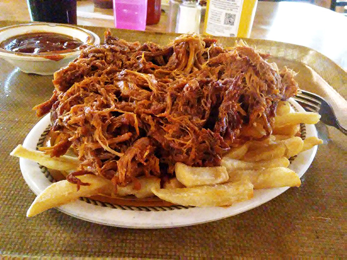 Pulled pork fries aren't just a side dish&mdash;they're a declaration that potatoes deserve better than ketchup. This is French fry enlightenment.