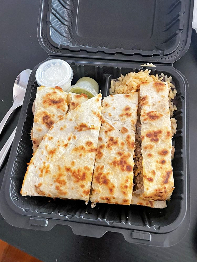 This quesadilla isn't playing games&mdash;substantial, satisfying, and sliced with the precision of someone who respects both geometry and hunger.