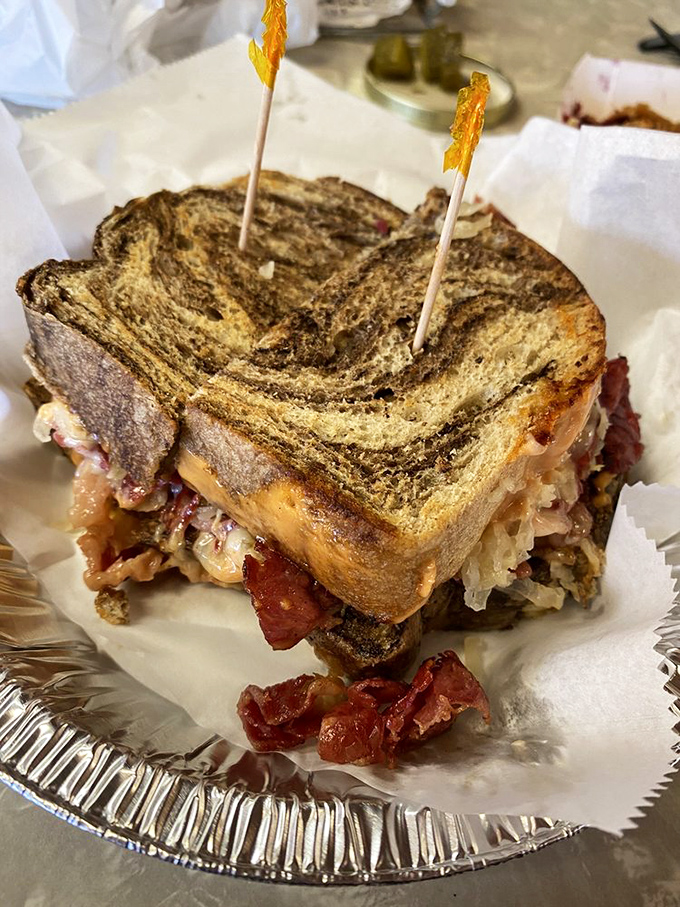 The bakery's bustling interior reveals the true measure of a great food spot: locals willing to wait in line for their favorite treats.
