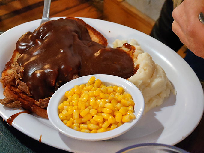 This isn't just roast beef&mdash;it's a brown gravy masterpiece. The mashed potatoes stand ready to soak up that savory goodness like edible sponges.