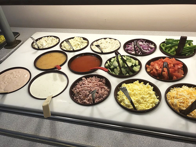 The salad bar stands as a token gesture to health consciousness, though the creamy dressings suggest it's more about solidarity than sacrifice.