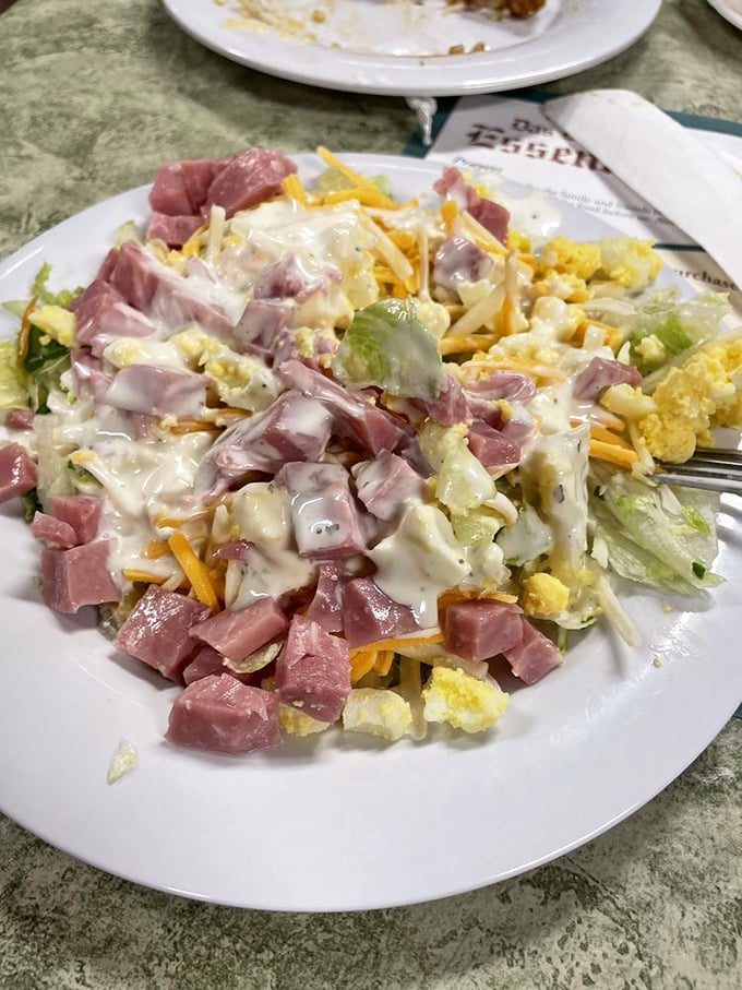 A chef's salad that proves vegetables can party too&mdash;especially when they invite ham, cheese, and egg to join the celebration under a rainfall of creamy dressing.