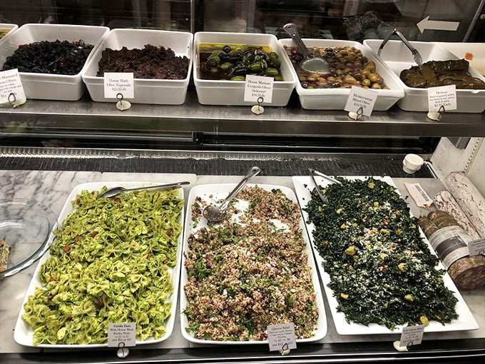 A rainbow of salads and olives awaits the health-conscious and the flavor-seekers alike. These aren't afterthoughts&mdash;they're co-stars to the sandwich headliners.