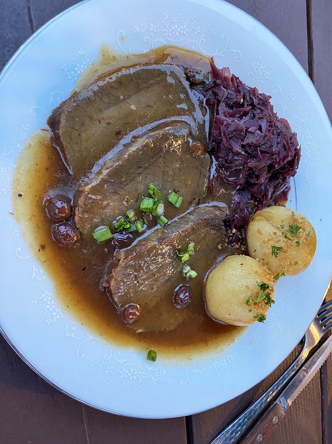 Sauerbraten that transports you straight to Germany. Fork-tender beef swimming in rich gravy alongside red cabbage and potatoes is comfort defined.