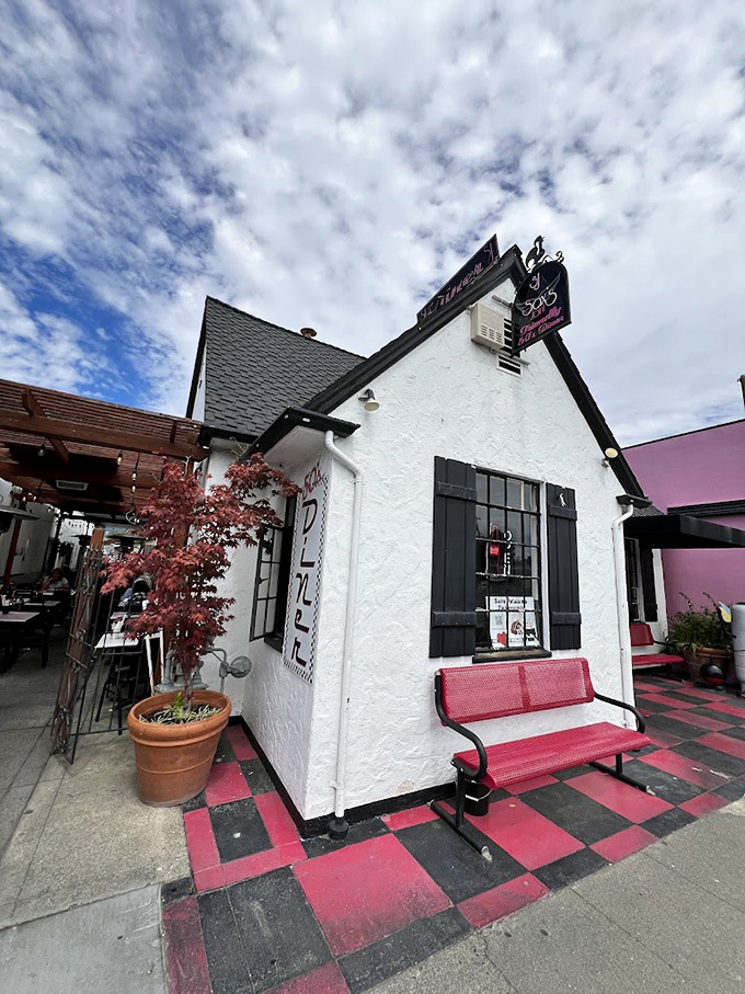 Sax's Joint looks like it was plucked from a 1950s postcard. That checkerboard patio practically demands you order a milkshake and solve a mystery.