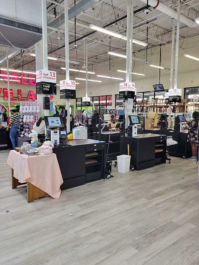 Checkout counters stand ready for the moment when treasure hunters finally admit defeat to their aching feet and full carts.
