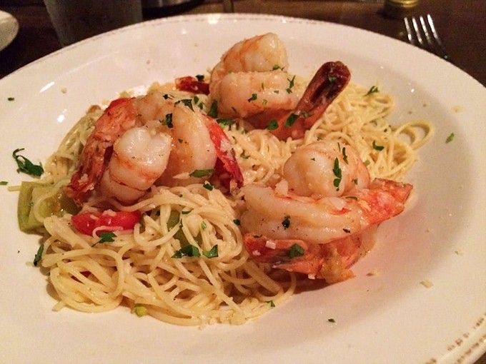 These plump shrimp nestled in pasta aren't just seafood&mdash;they're ocean ambassadors bringing coastal flavors to the heartland with diplomatic immunity from calories.