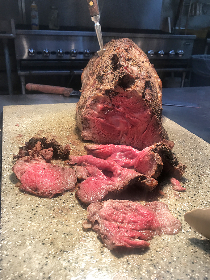 The prime rib in its natural habitat&mdash;gloriously rare and waiting for its close-up. Meat that makes vegetarians question their life choices.