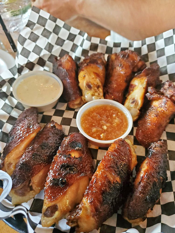 These wings aren't just smoked, they're transformed. Two dipping sauces because life is about choices, delicious choices.