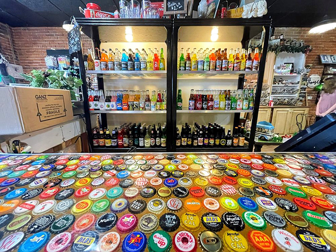 The bottle cap counter tells stories of refreshment through the decades&mdash;a fizzy museum where nostalgia meets thirst-quenching variety.