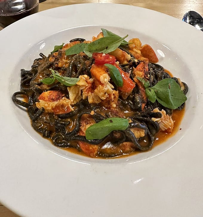 Squid ink pasta with Maine lobster&mdash;dramatic as a Sopranos finale and twice as satisfying. The black pasta creates a stunning backdrop for the seafood.