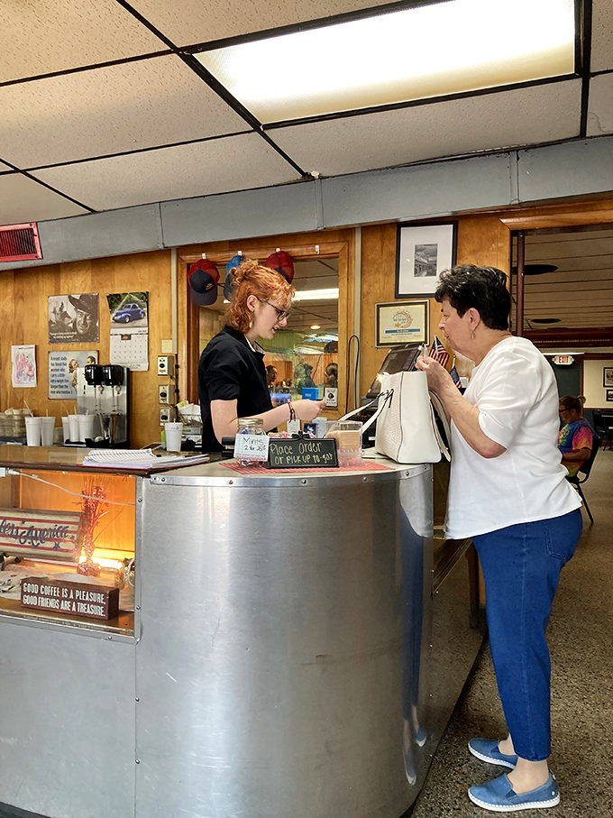 The counter where relationships are built one coffee refill at a time, and servers know exactly how you like your eggs.