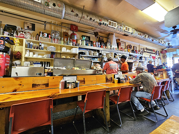 The counter seating offers front-row tickets to the culinary show, where efficiency meets art in a choreographed dance of short-order perfection.