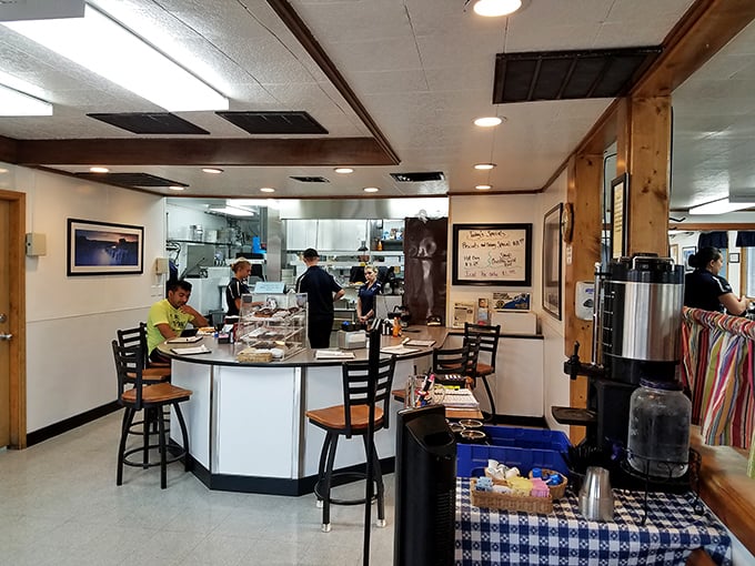 The open kitchen design lets you watch breakfast magic happen in real time. Like dinner theater, but with hash browns and much better hours.