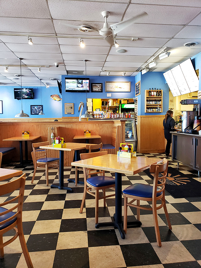 The bright blue walls and wooden accents create that perfect "come as you are" vibe that makes regulars out of first-timers.