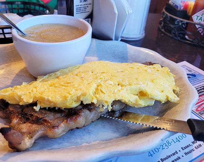 Steak and eggs&mdash;the power couple of breakfast foods. That fluffy yellow omelet draped over a perfectly cooked steak is morning perfection.