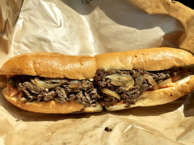 The KBBQ sandwich&mdash;where thinly sliced rib eye meets caramelized onions in a relationship so perfect it should have its own reality show.