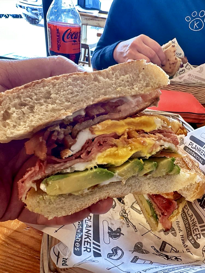 The sandwich that launched a thousand road trips. Layers of turkey, avocado, and bacon create a handheld masterpiece. 