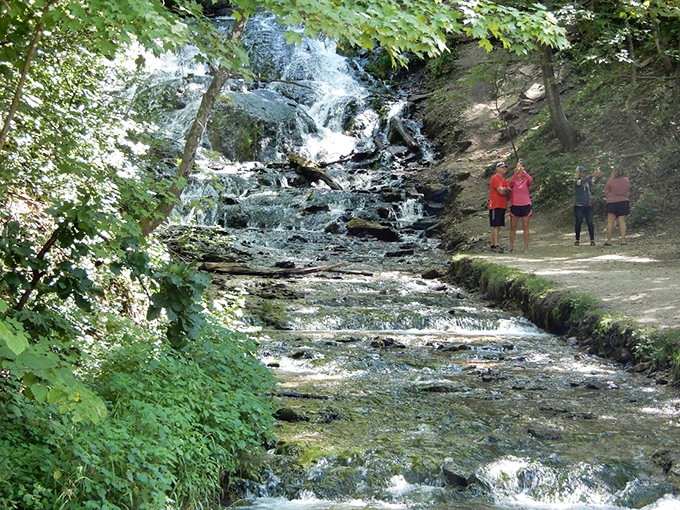 Cascading water creates nature's staircase at this popular Decorah spot. Even the visitors seem to become part of the landscape.