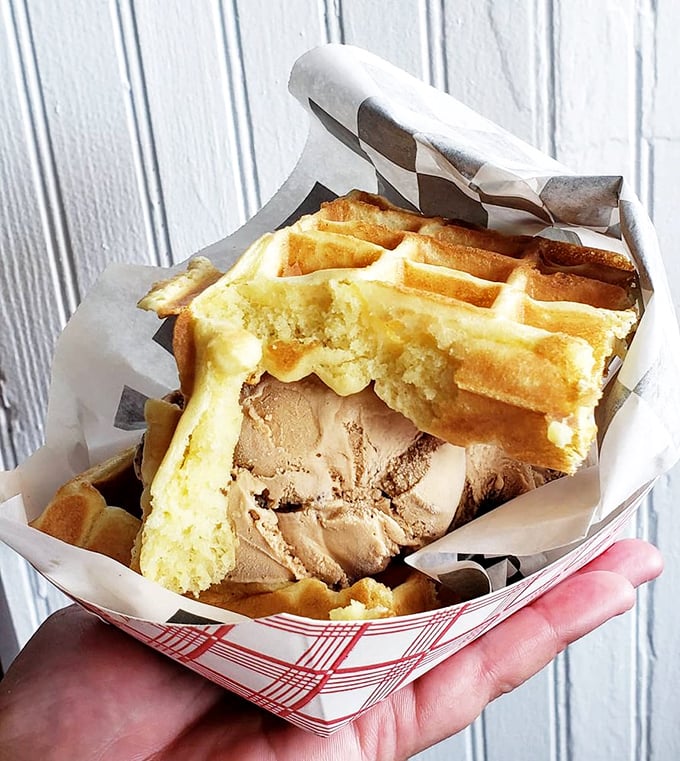 The ice cream sandwich reimagined: golden waffles embrace coffee ice cream in a handheld miracle that makes bread seem utterly pointless.