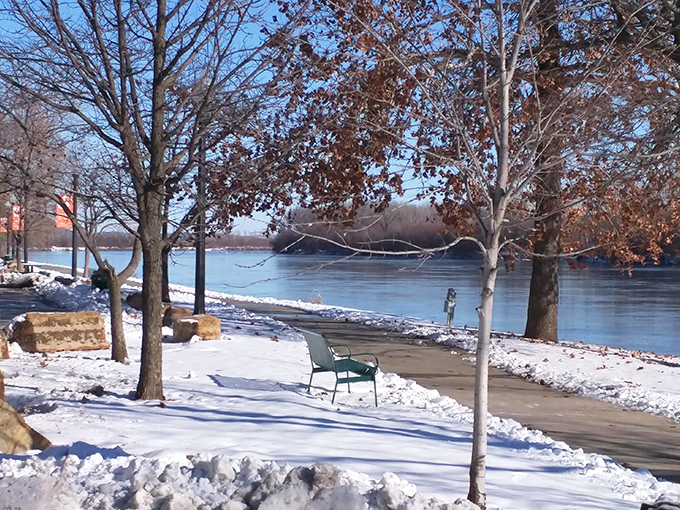 Winter transforms the riverfront into a serene snowscape, proving Atchison's beauty spans all seasons without seasonal price hikes.