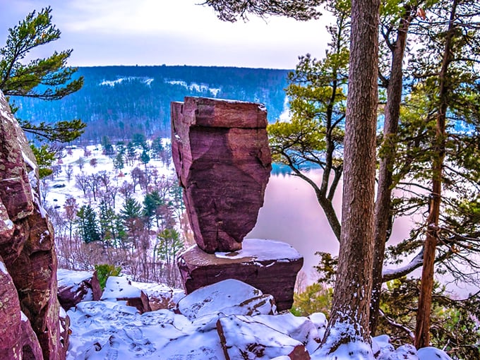 Balanced Rock at Devil's Lake defies both gravity and your smartphone camera's ability to capture its true majesty, especially in winter.