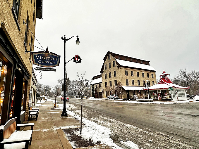 Winter in Cedarburg adds a dusting of snow to an already perfect scene. The Visitor Center sign points the way to warmth and information about this postcard-perfect town.