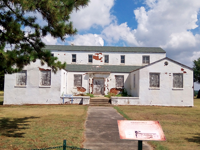 The adjutant's office has seen better days, its peeling paint and exposed brick telling stories of Oklahoma weather's relentless assault on human ambition.