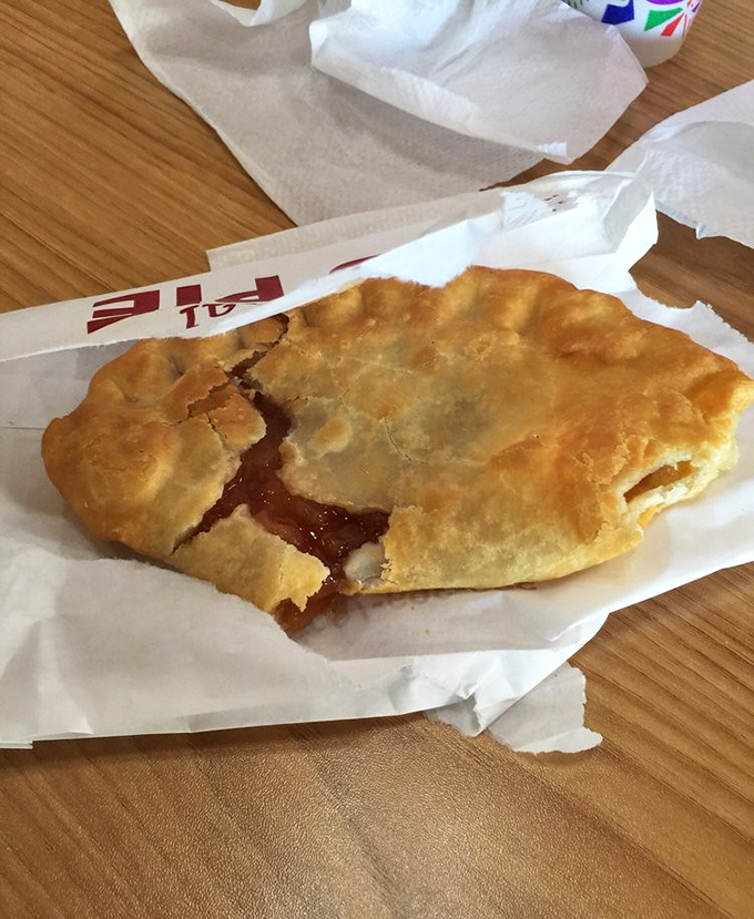 The classic apple pie in its final, glorious form. That golden-brown crust is the treasure map, and the sweet-tart filling is X marks the spot. 