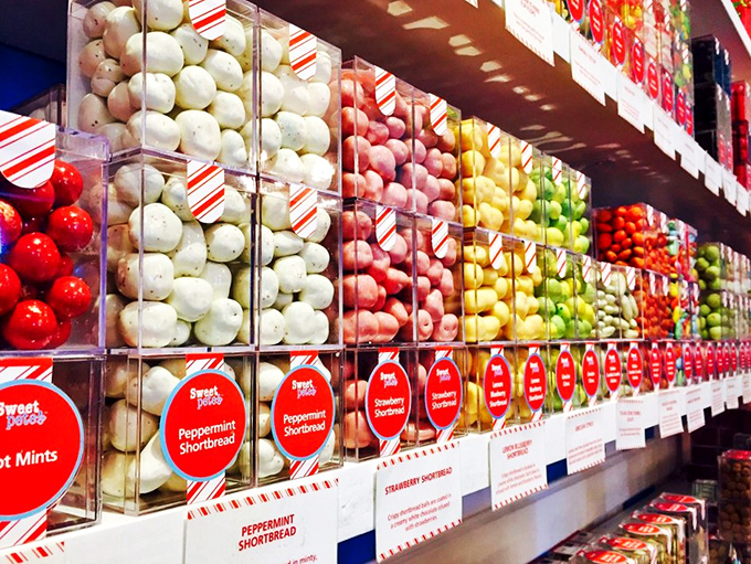 A rainbow of perfectly organized candies that makes you wonder if color-coordinated happiness is actually a scientific formula.