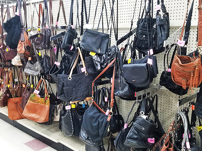 The handbag wall&mdash;where designer lookalikes and genuine vintage finds hang like leather and vinyl fruit, ripe for the picking.