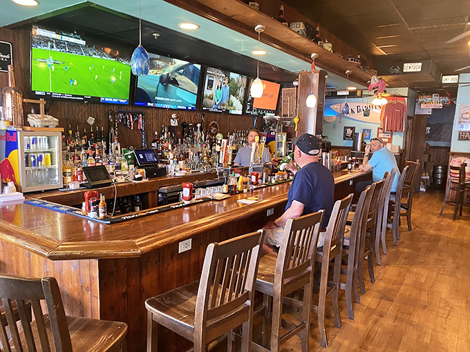 The bar at Woody's isn't just a place to order drinks&mdash;it's command central for game watching, story sharing, and crab cake anticipation.
