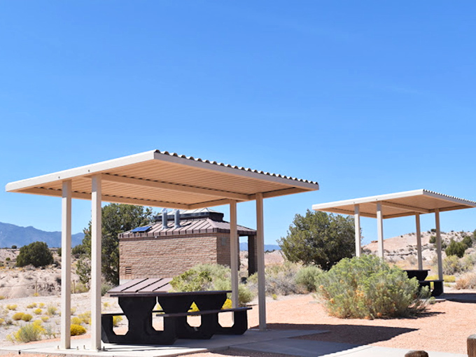 Modern amenities meet ancient landscapes at Cathedral Gorge's picnic area. These shaded tables invite you to enjoy lunch with a side of geological wonder.