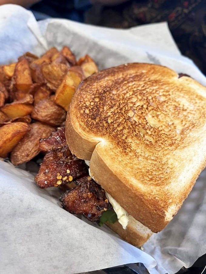 This BLT isn't playing around. The toast is golden like a summer sunset, and those potatoes are ready for their close-up.
