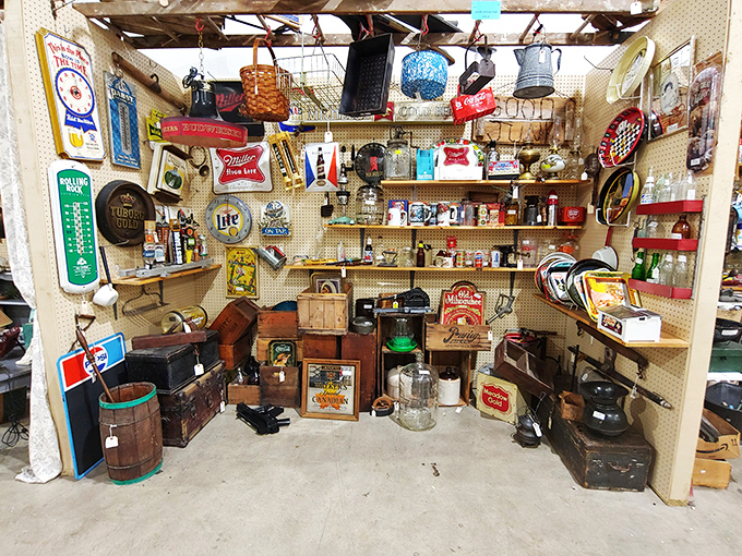 This booth combines advertising nostalgia with rustic Americana. That Miller Lite sign probably illuminated conversations long before social media existed.