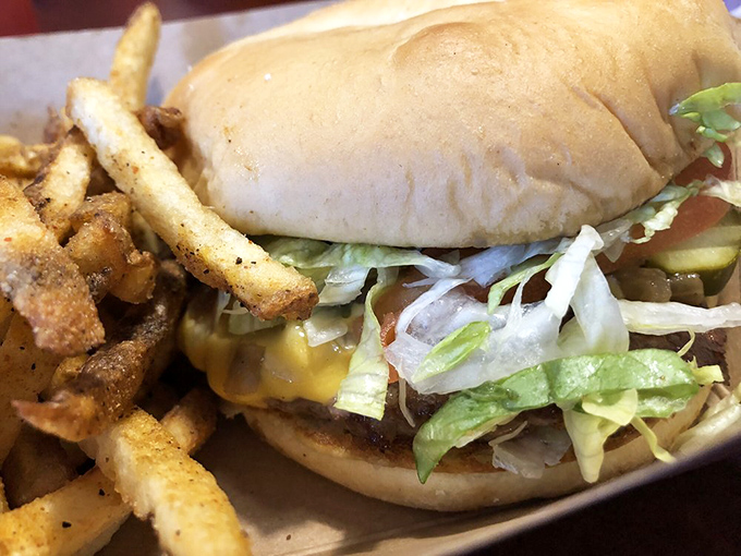 Close enough to smell the beef! This perfect sidekick of hand-cut fries completes the burger symphony that Tay's conducts daily.