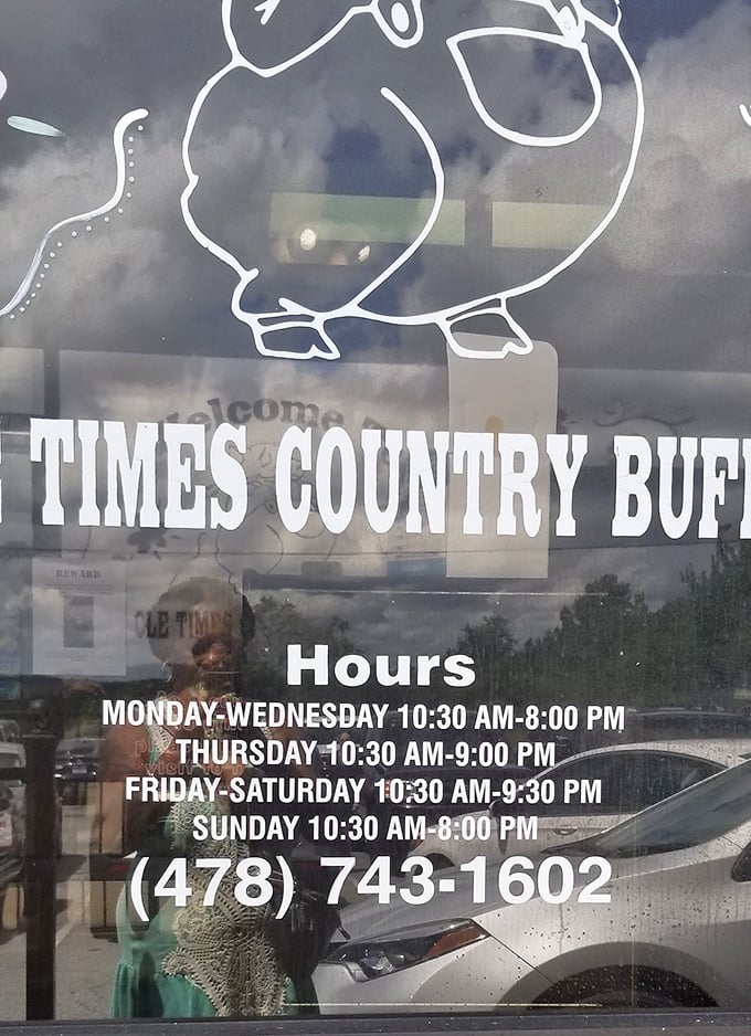 The hours of operation displayed on the door &ndash; crucial information for planning your stretchy-pants expedition to this temple of Southern cuisine.