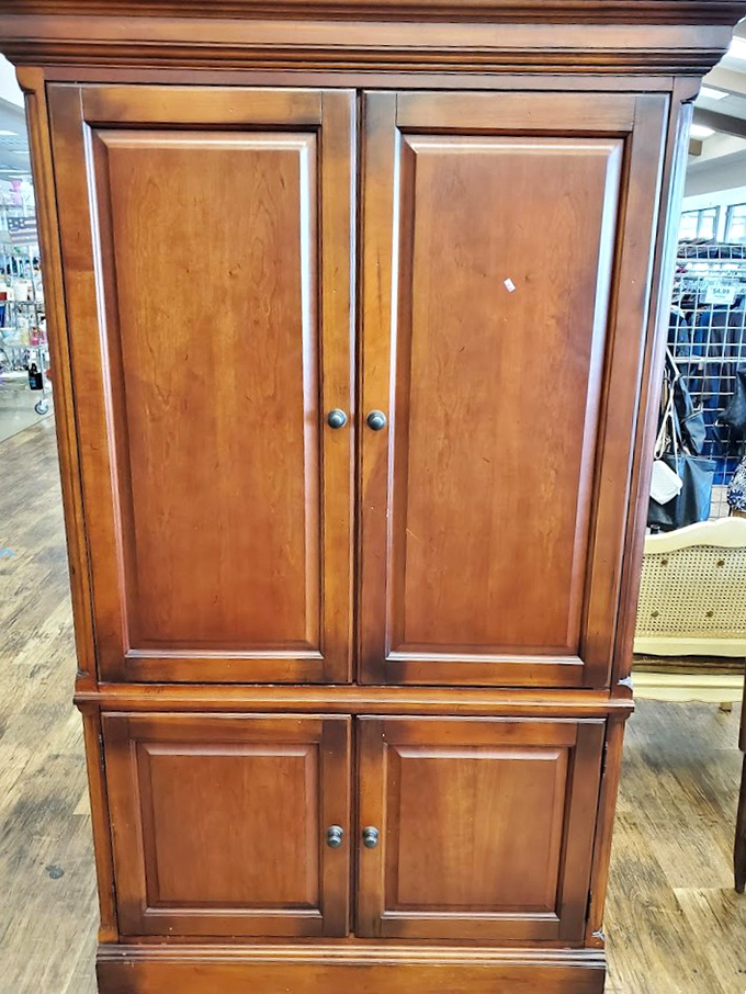 This handsome cabinet has seen things. Probably held someone's wedding china before witnessing their divorce and subsequent donation spree.