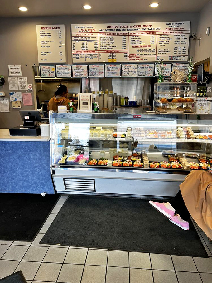 The counter where seafood dreams come true. That display case is like an aquatic jewelry box filled with edible treasures.